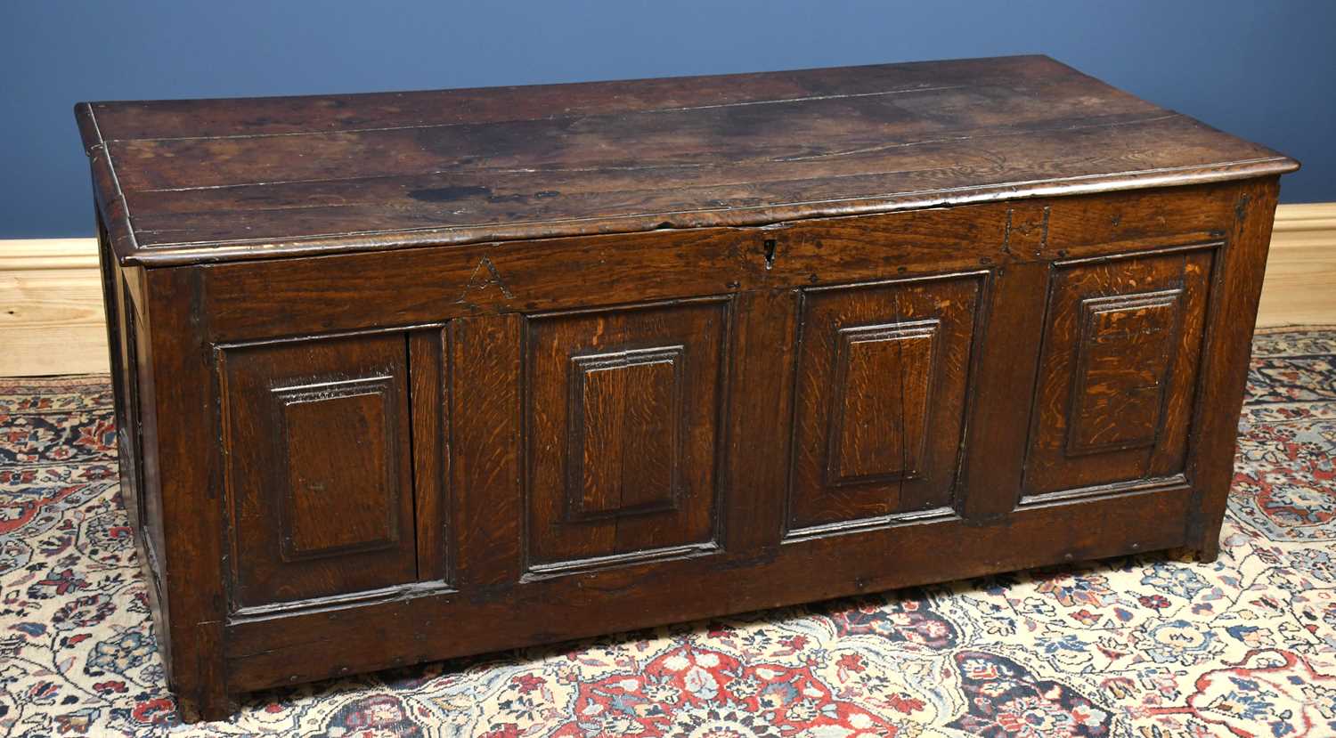 Lot 2740 - An 18th century oak coffer, with four panel