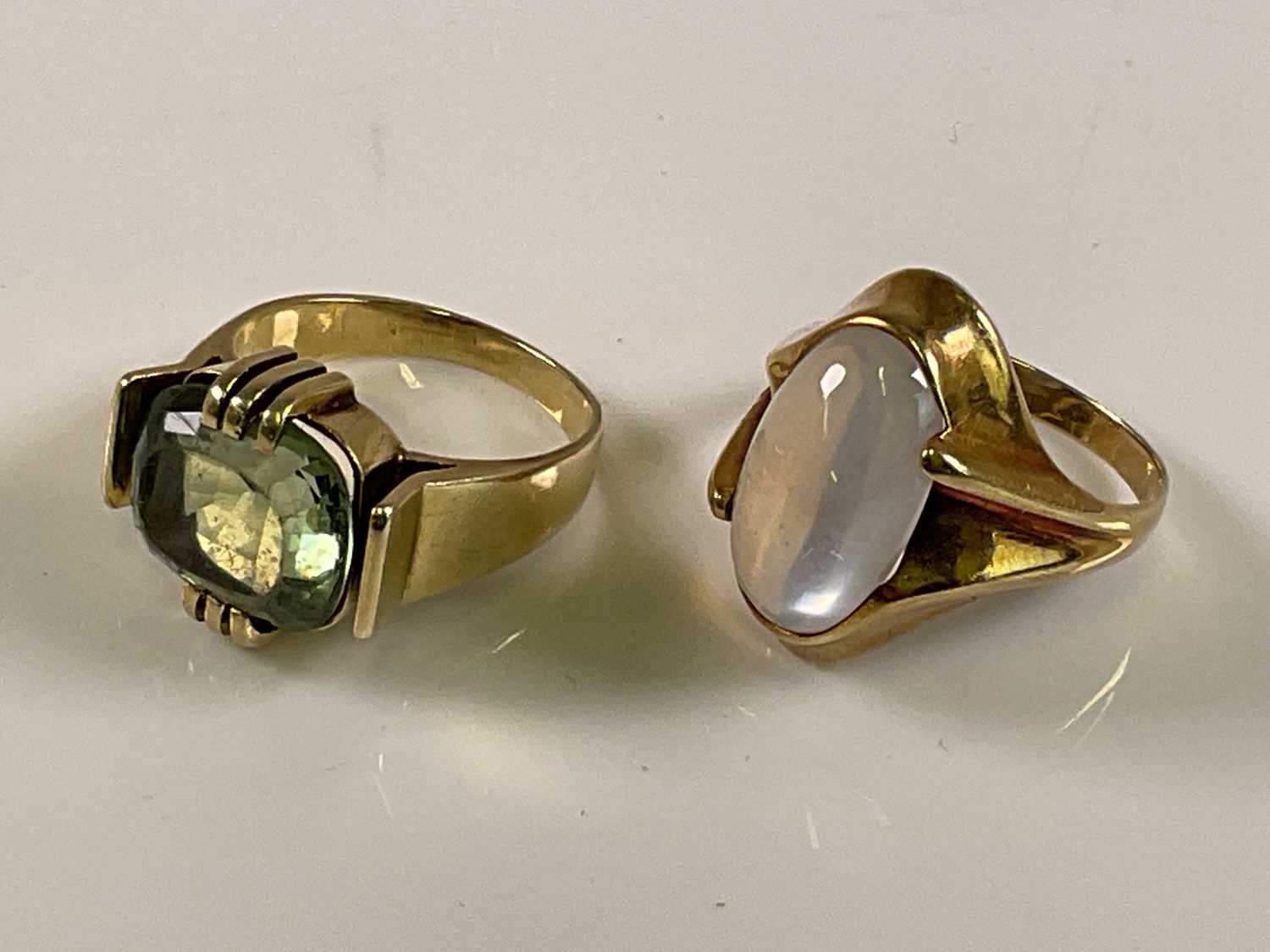 Lot 566 - Two 14ct yellow gold dress rings, one set