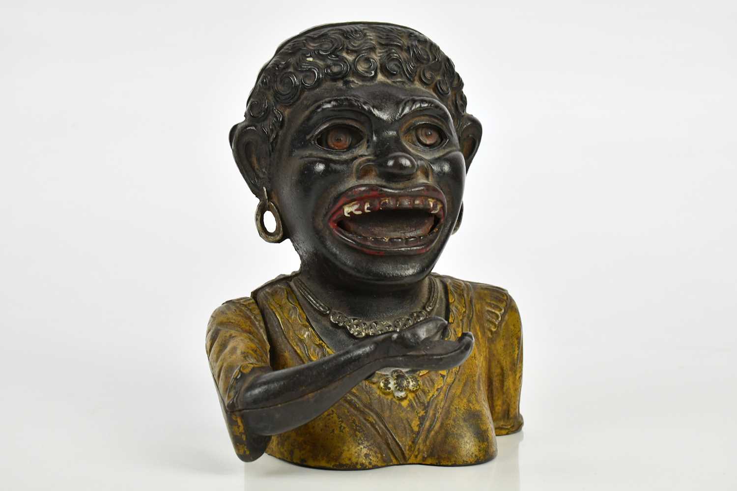 Lot 1278 - A cast iron 'Dinah' money box.