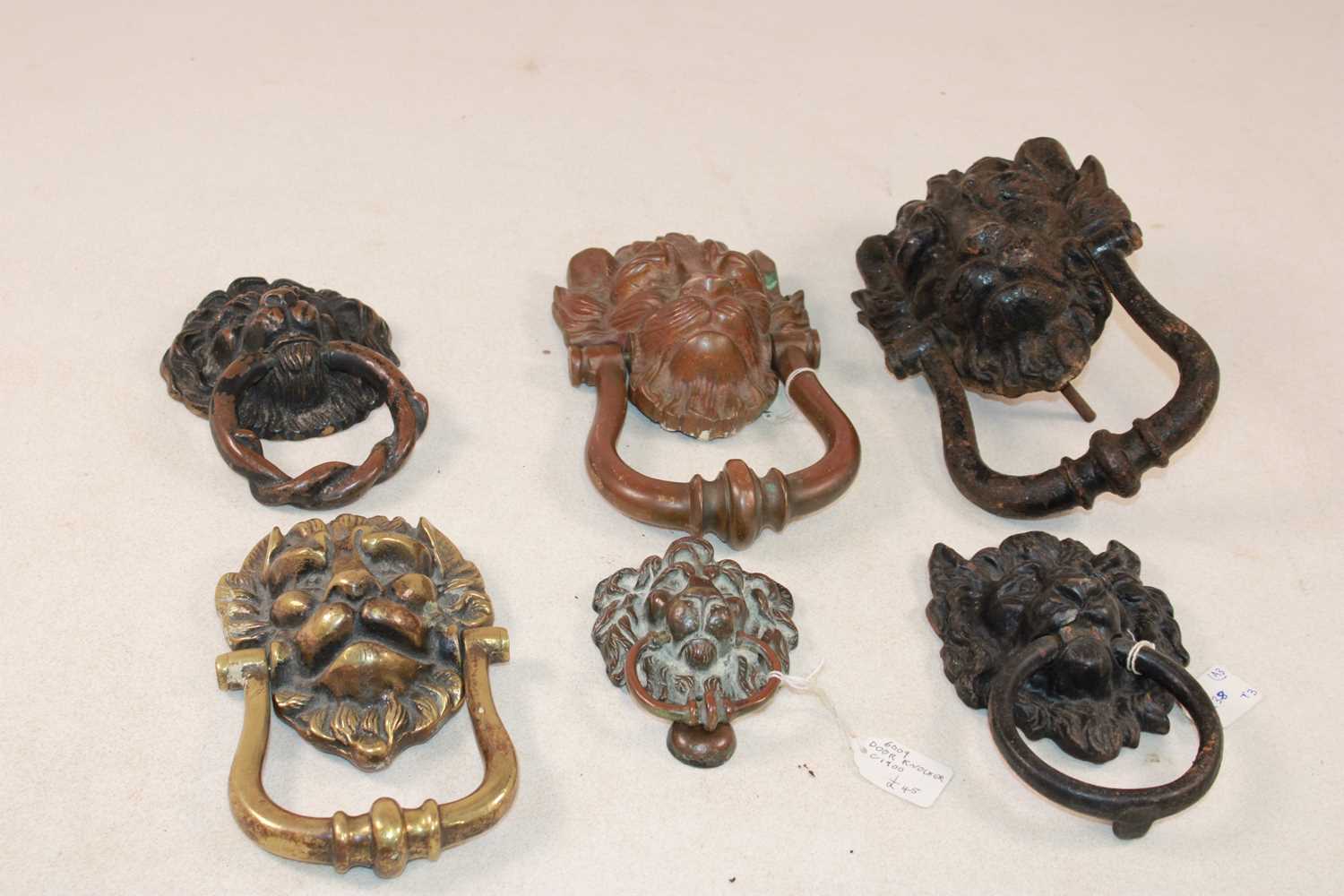 Lot 1122 - Six late 19th/early 20th century lion mask