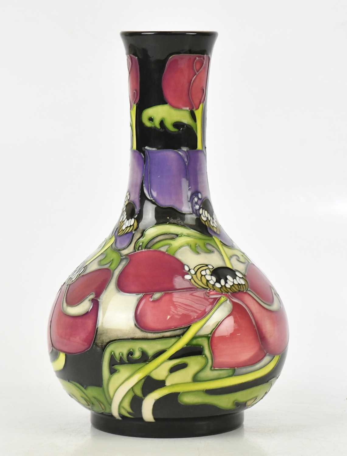 Lot 98 - EMMA BOSSONS FOR MOORCROFT; a baluster shaped
