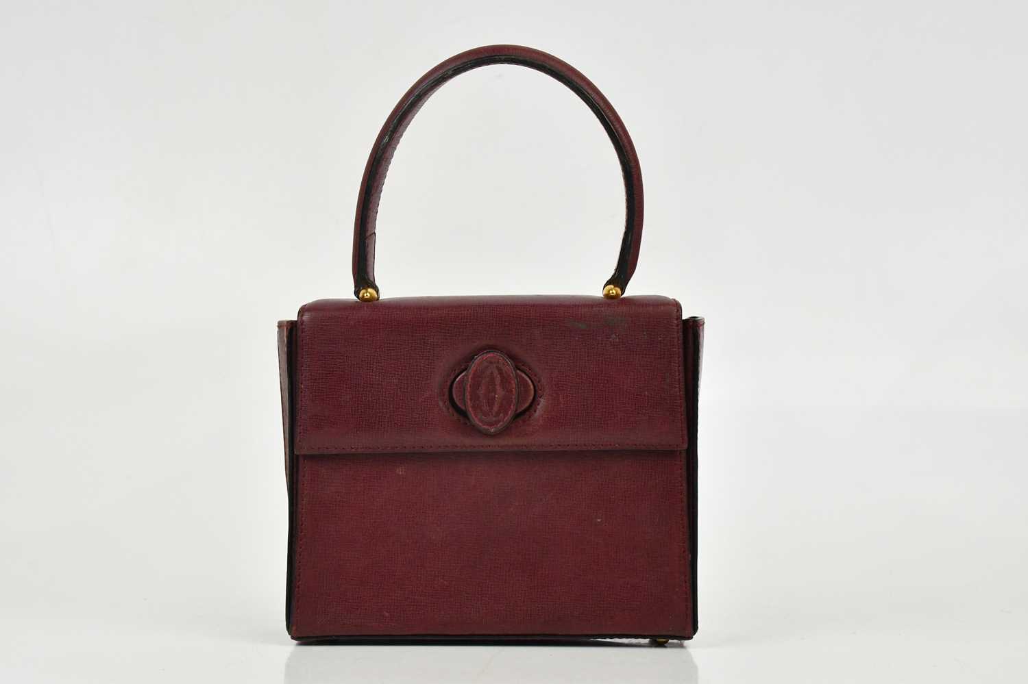 Lot 257 - CARTIER; a Must de Cartier 2C logo red