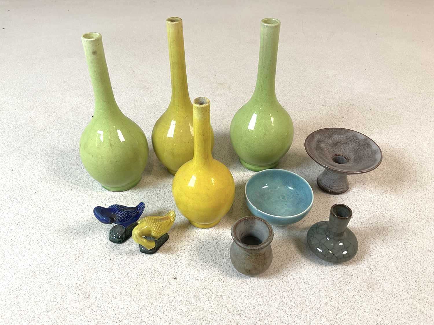 Lot 372 - Four monotone bottleneck vases, a small