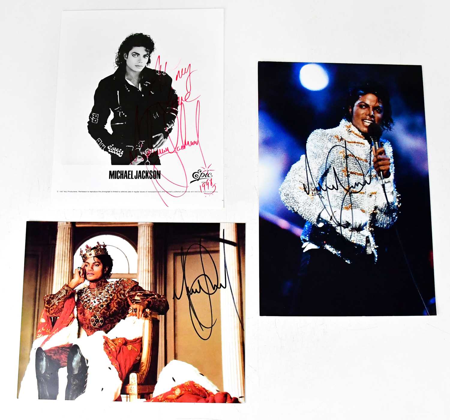 Lot 311 - MICHAEL JACKSON; two signed colour
