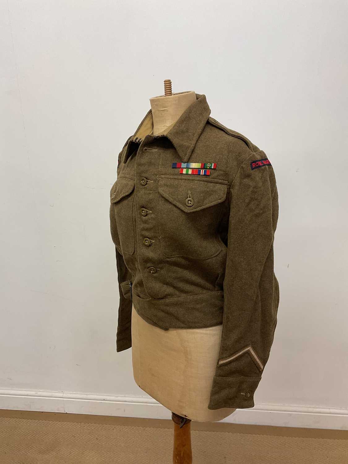 Lot 282 - A 1943 Royal Marine battle dress jacket,