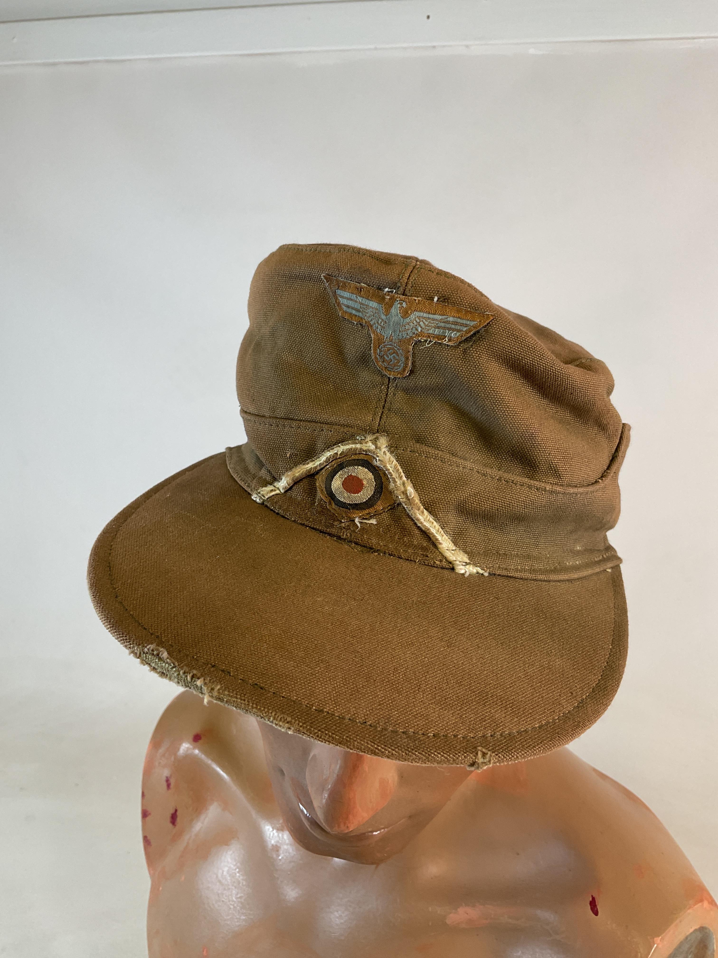 Lot 257 - A WWII German desert forage cap, with