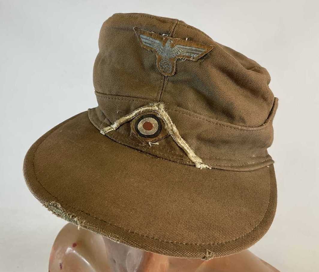 Lot 257 - A WWII German desert forage cap, with