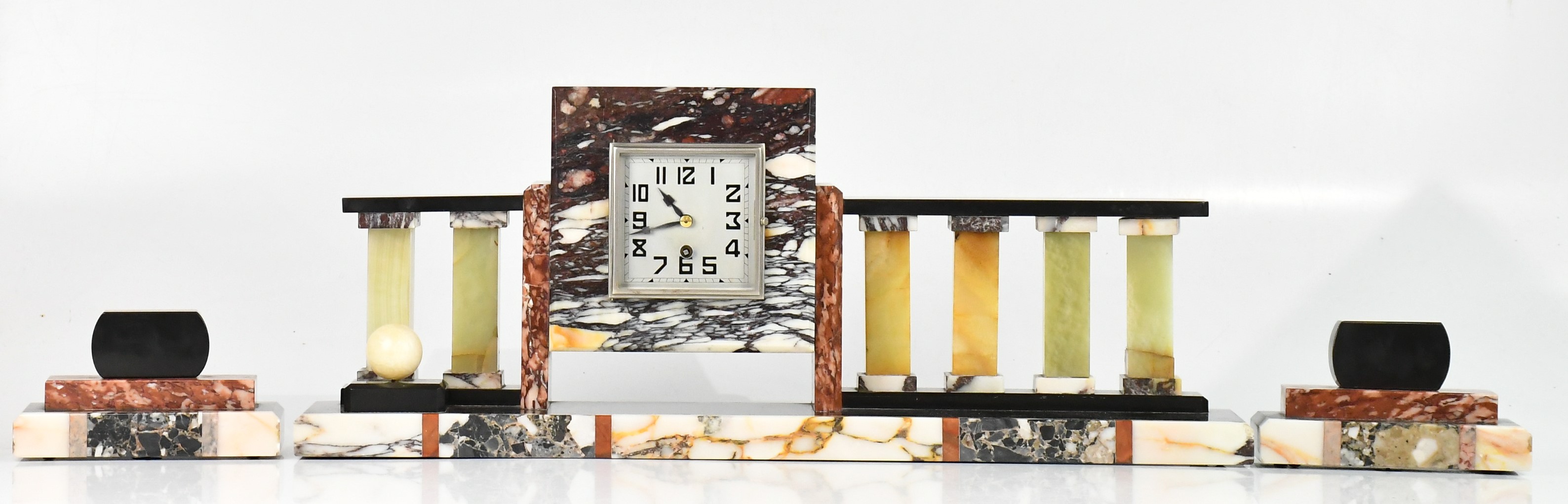 Lot 211 - An Art Deco marble and slate mantel clock,