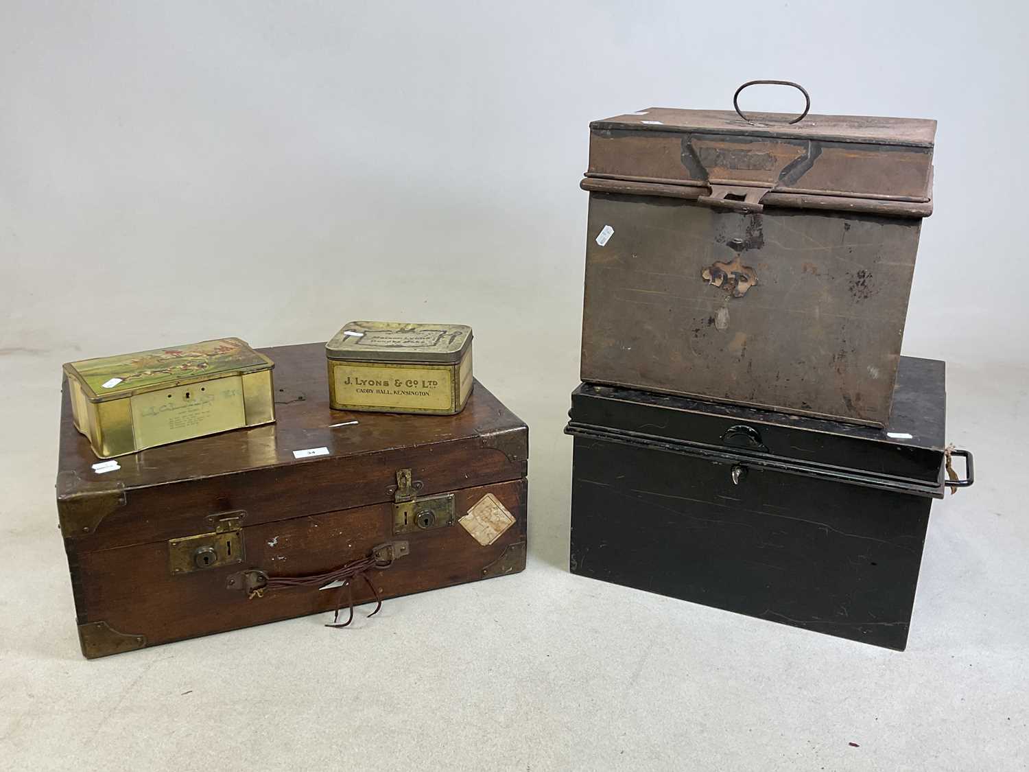 Lot 34 - A wooden case with brass locks and detail,
