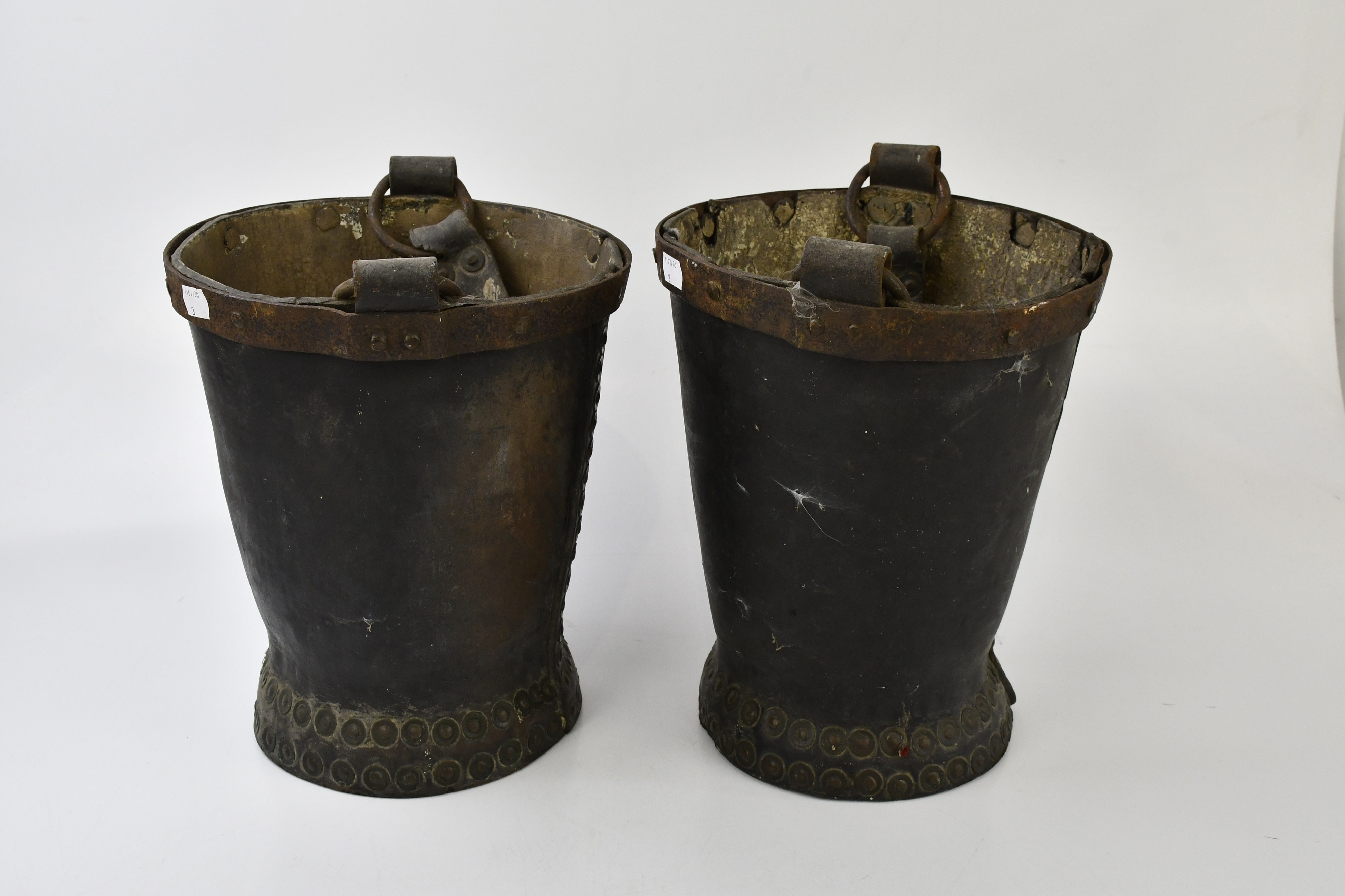 Lot 2403 - A pair of leather fire buckets, with brass