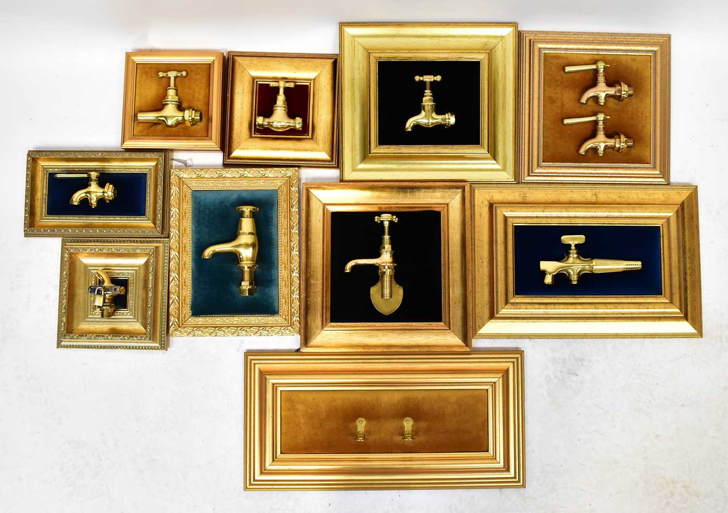 Lot 212 - Nine highly polished brass taps mounted on