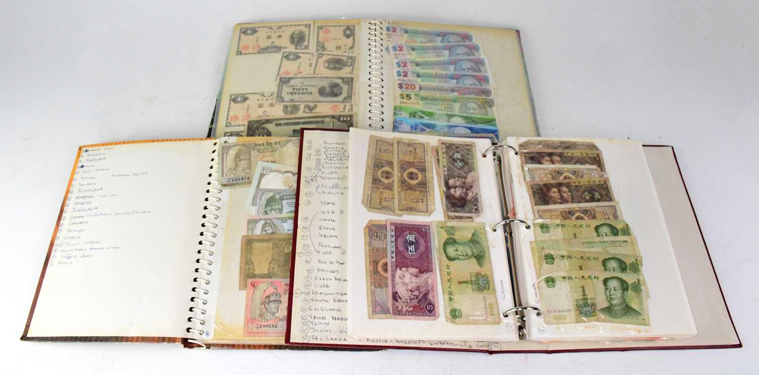 Lot 840 - Three albums of world banknotes, mainly