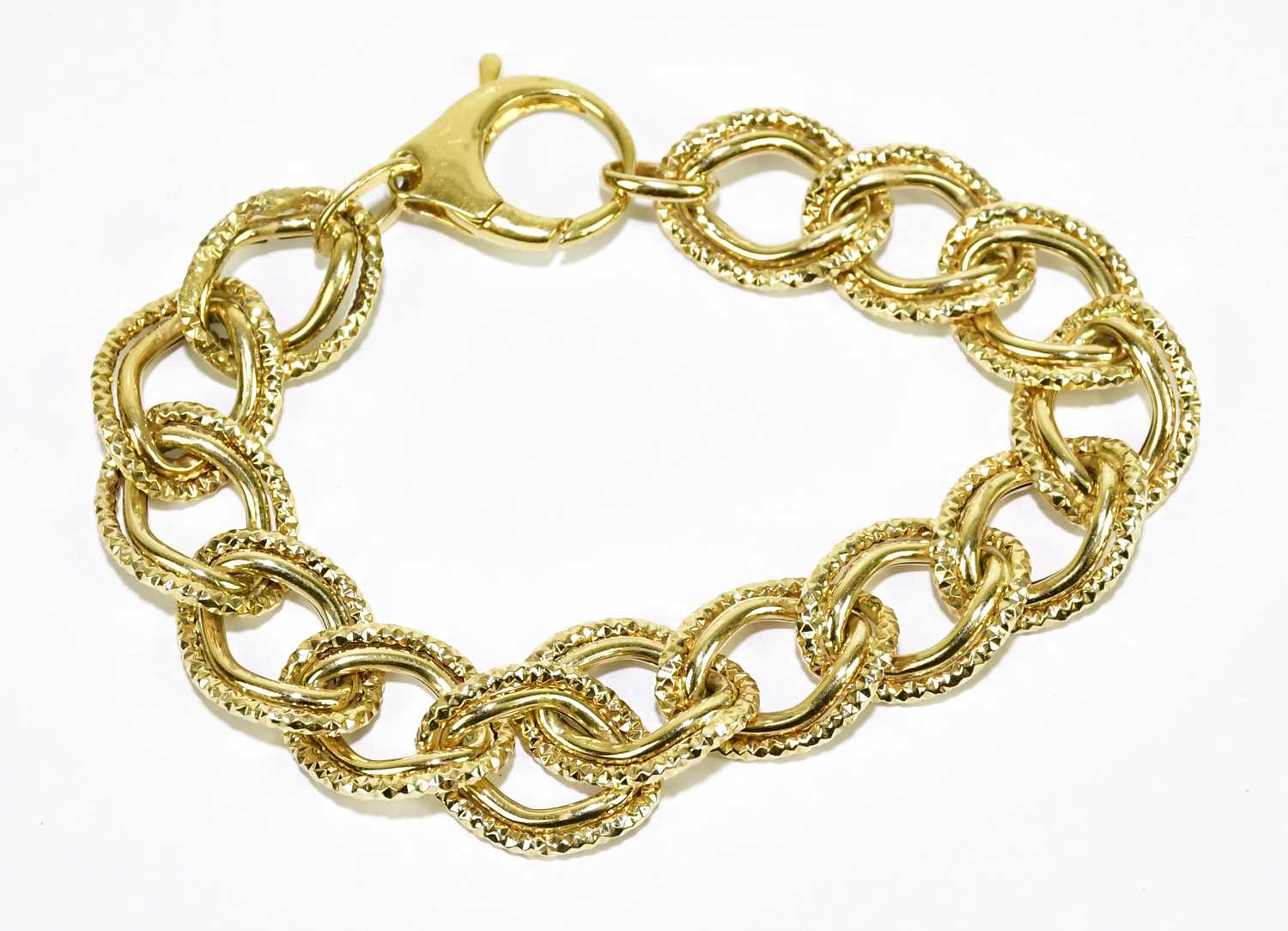 Lot 164 - A gold hoop link bracelet, stamped 14K,