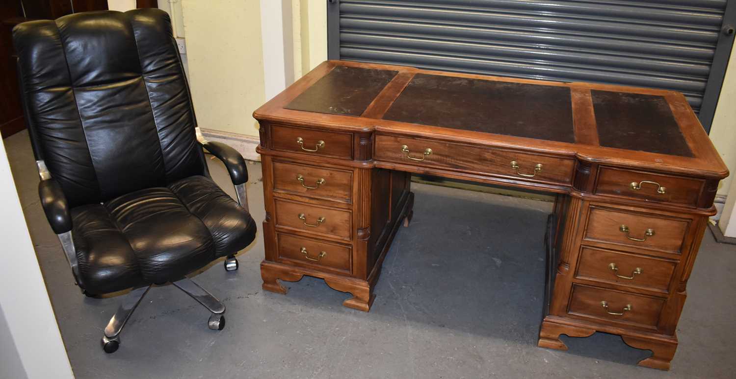 Lot 14 - A reproduction hardwood partner's desk, 149 x
