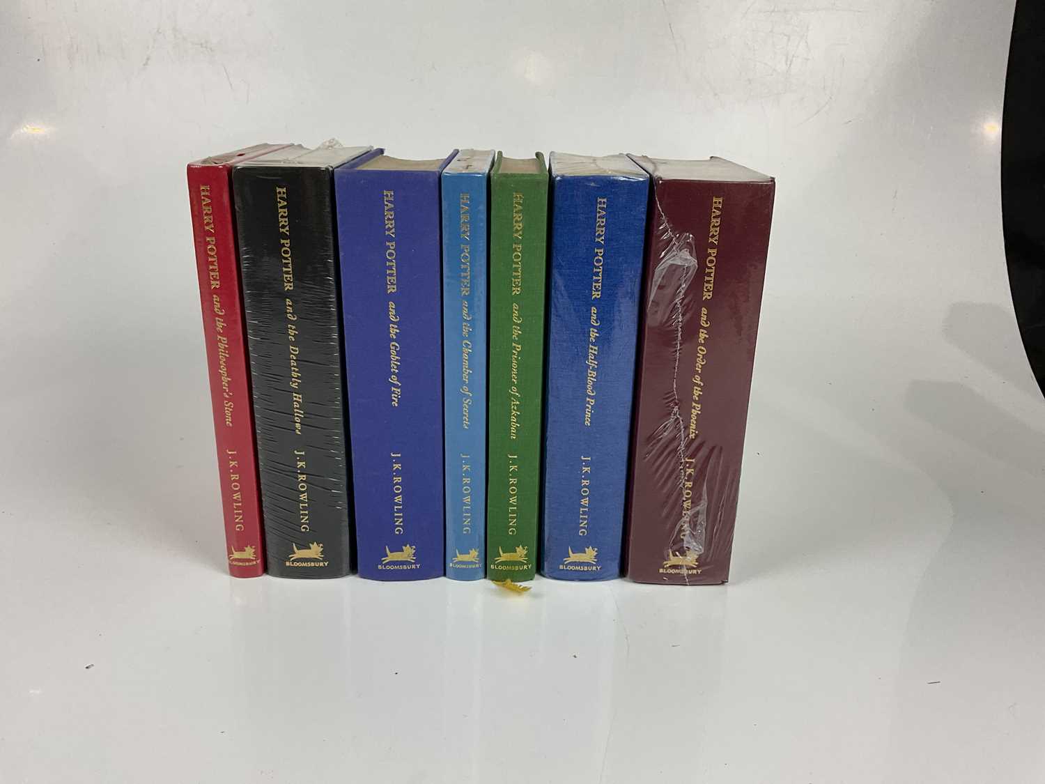 Lot 1632 - ROWLING, (J.K); seven Harry Potter hardback