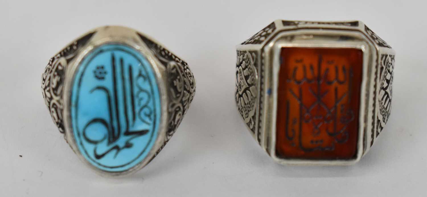 Lot 675 - Two Islamic white metal rings.