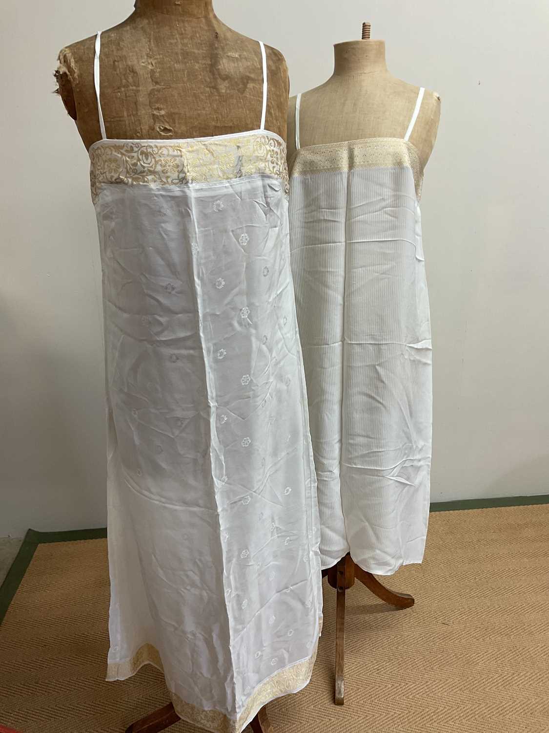 Lot 238 - A quantity of Chinese silk slips, a