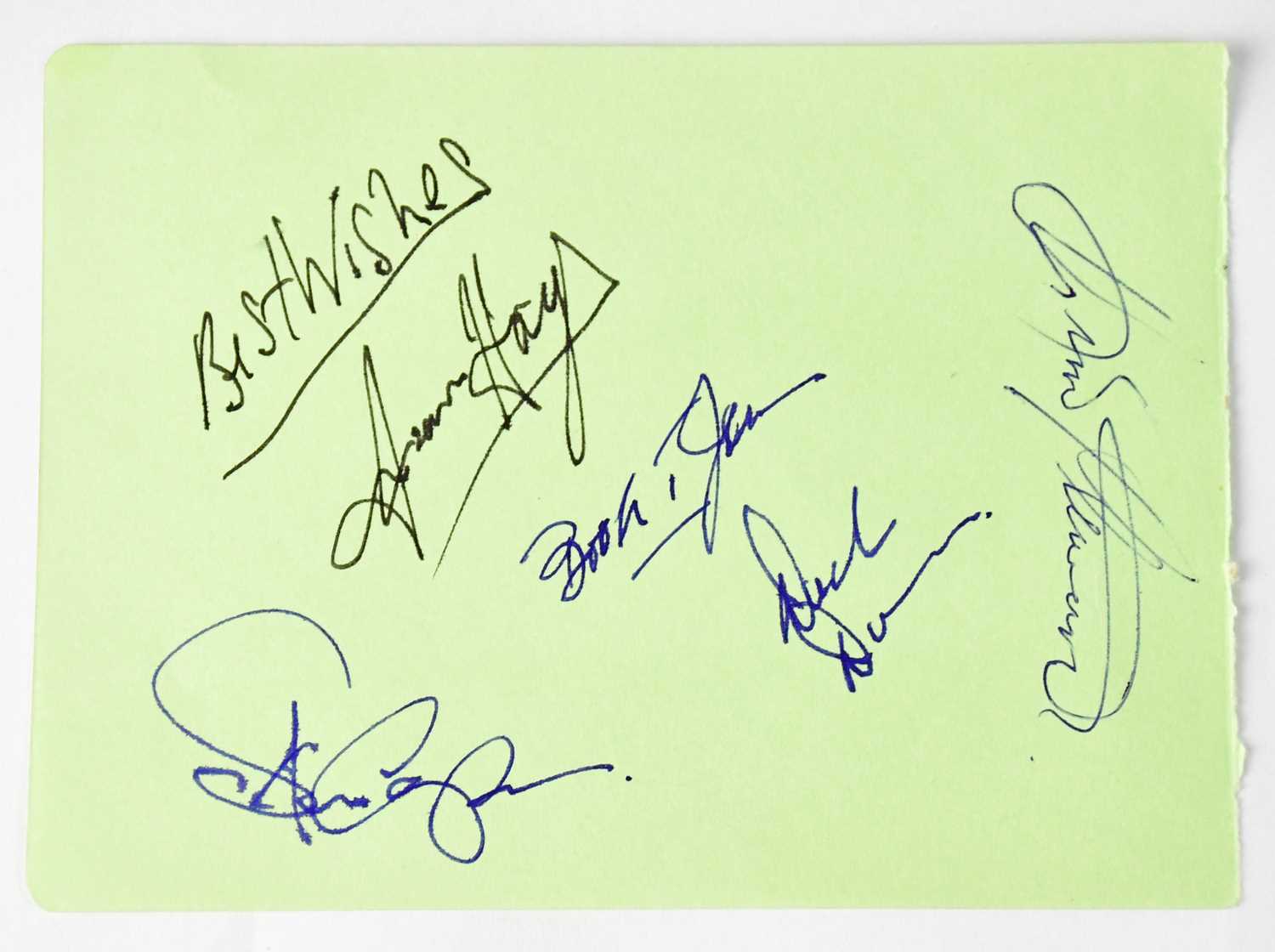 Lot 550 - A torn page from an autograph book bearing