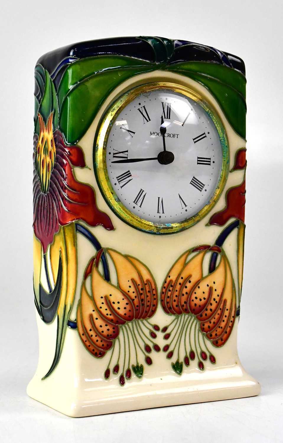 Lot 351 - MOORCROFT; an 'Anna Lily' pattern mantel