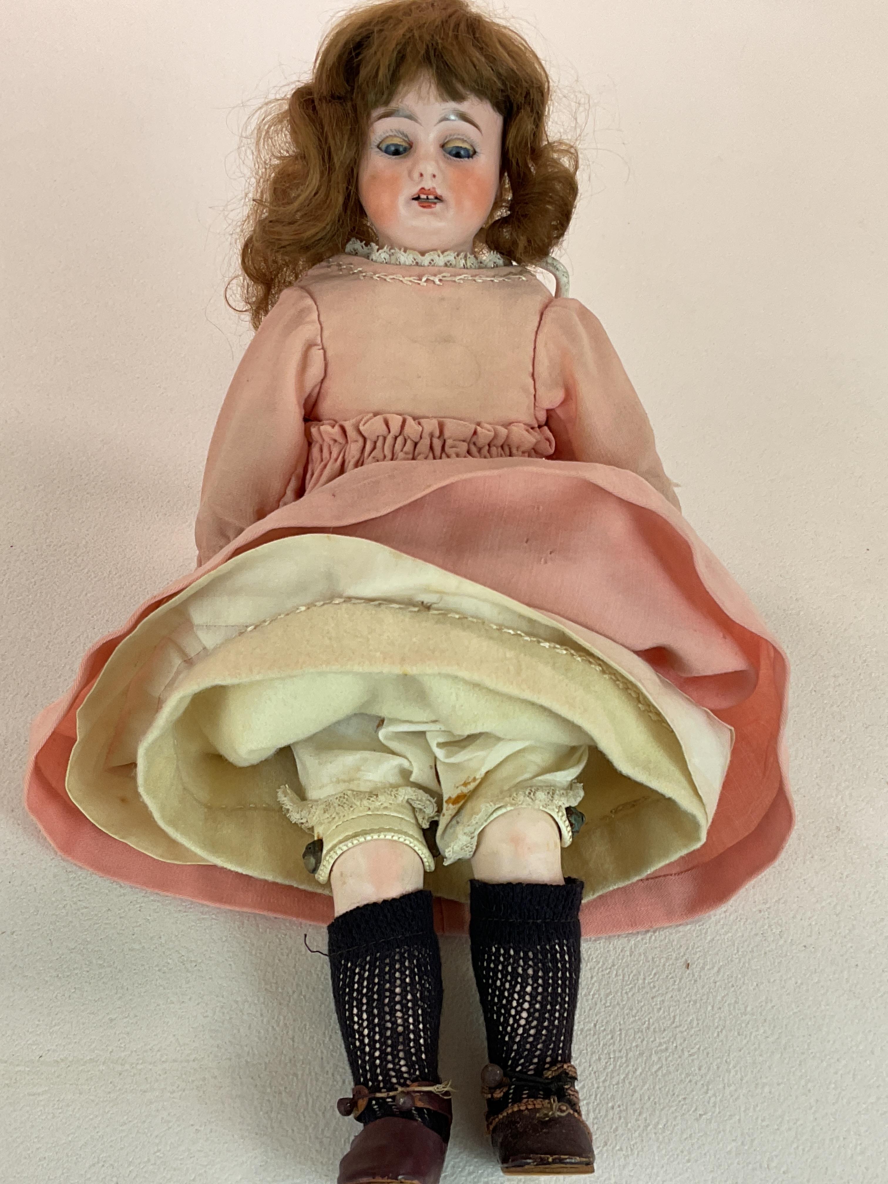 Lot 259 - A Rohmer style doll with china head and arms