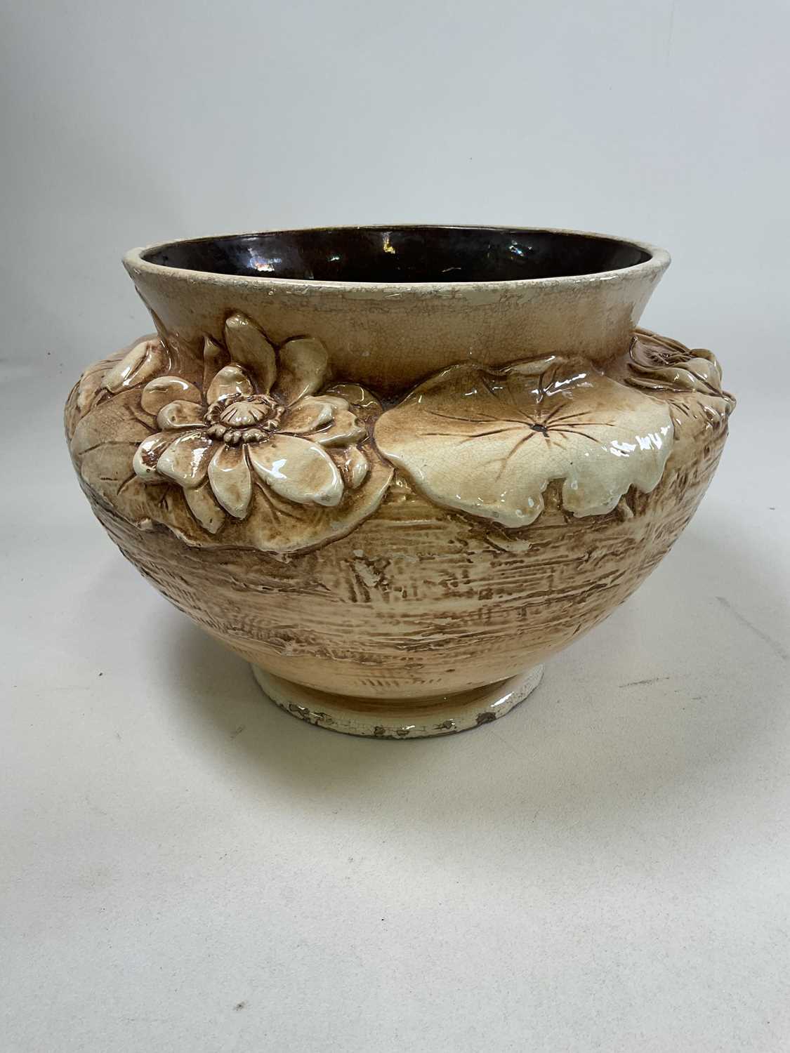 Lot 317 - BRETBY; a large floral design Bretby pot,