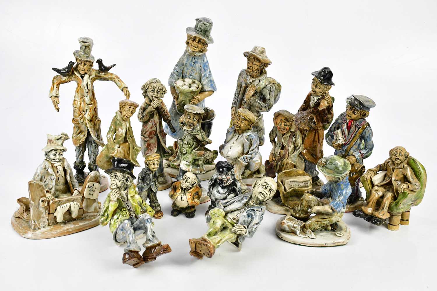 Lot 1556 - NORMAN UNDERHILL; a collection of figures