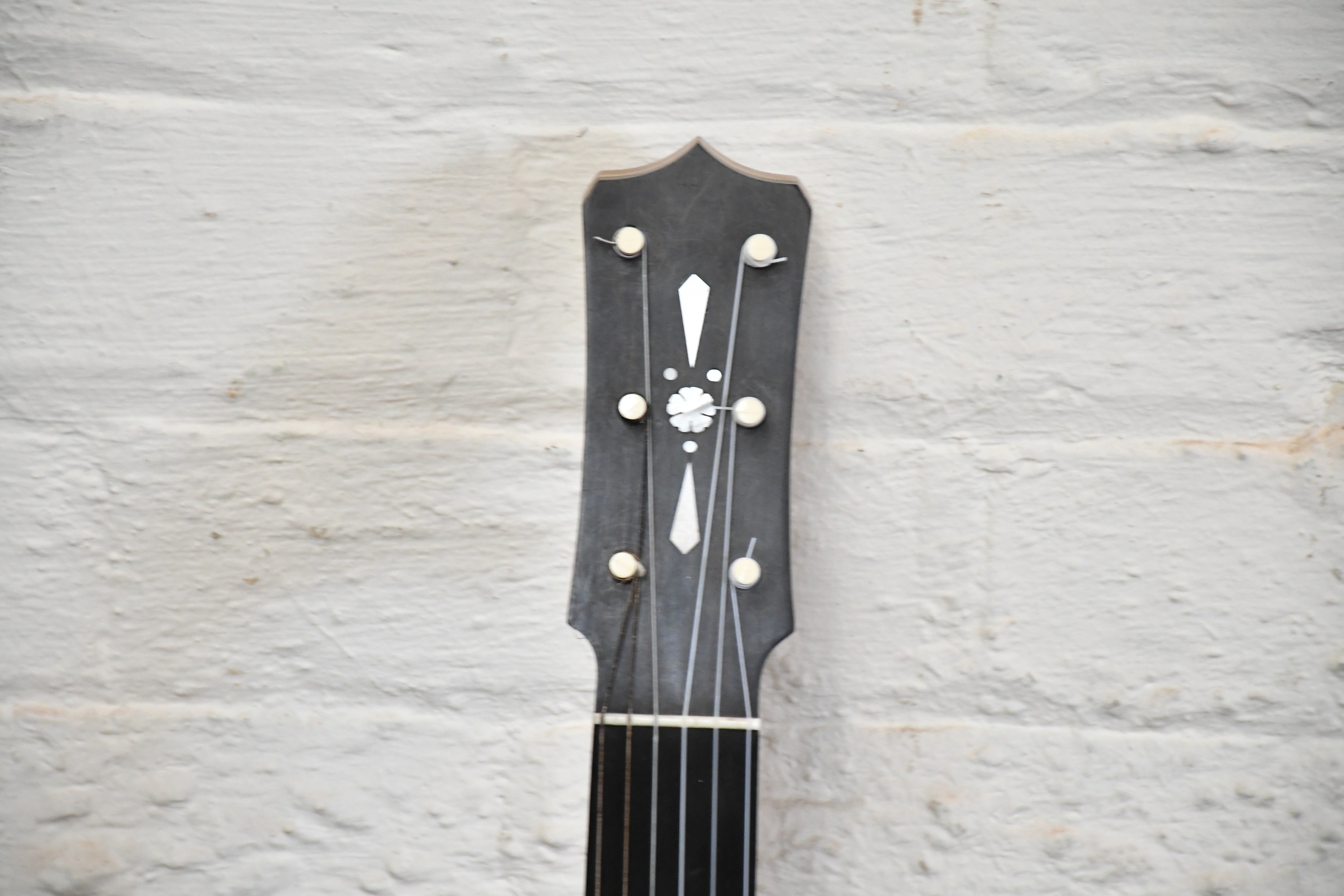 Lot 1532 - A fretless seven string banjo with mother