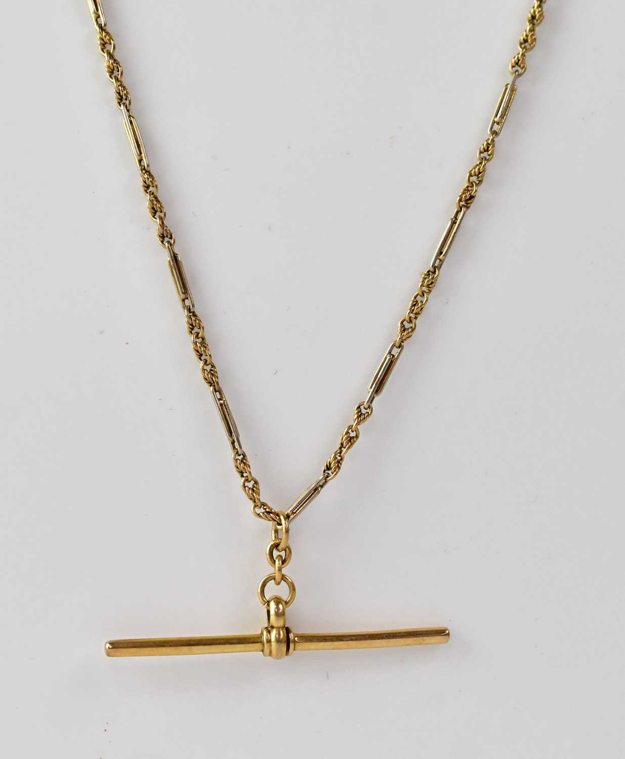 Lot 1302 - A 9ct gold dainty bar and chain link watch