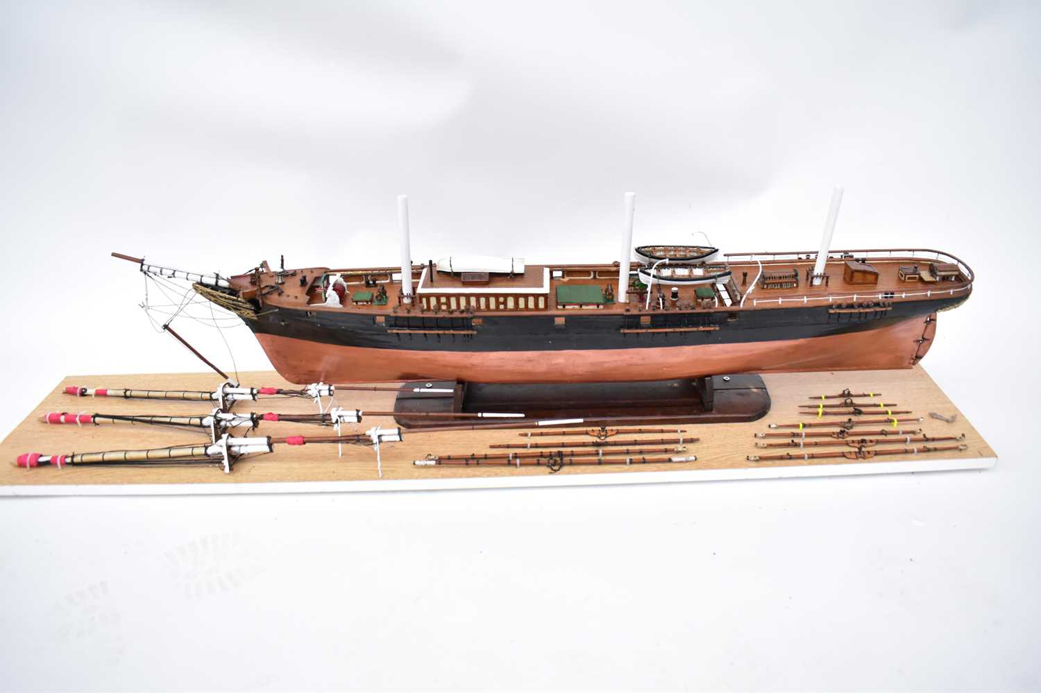 Lot 258 - A wooden model of a steam cruiser on a stand,