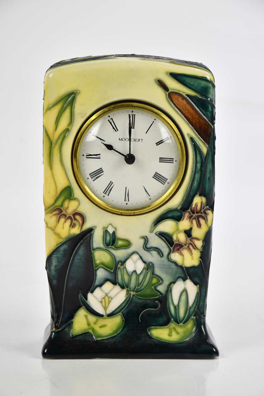 Lot 86 - MOORCROFT; a 'Lamia' pattern mantel clock,