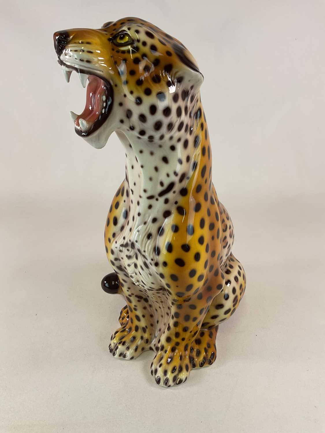 Lot 328 - A large ceramic Cheetah figure, height 79cm,