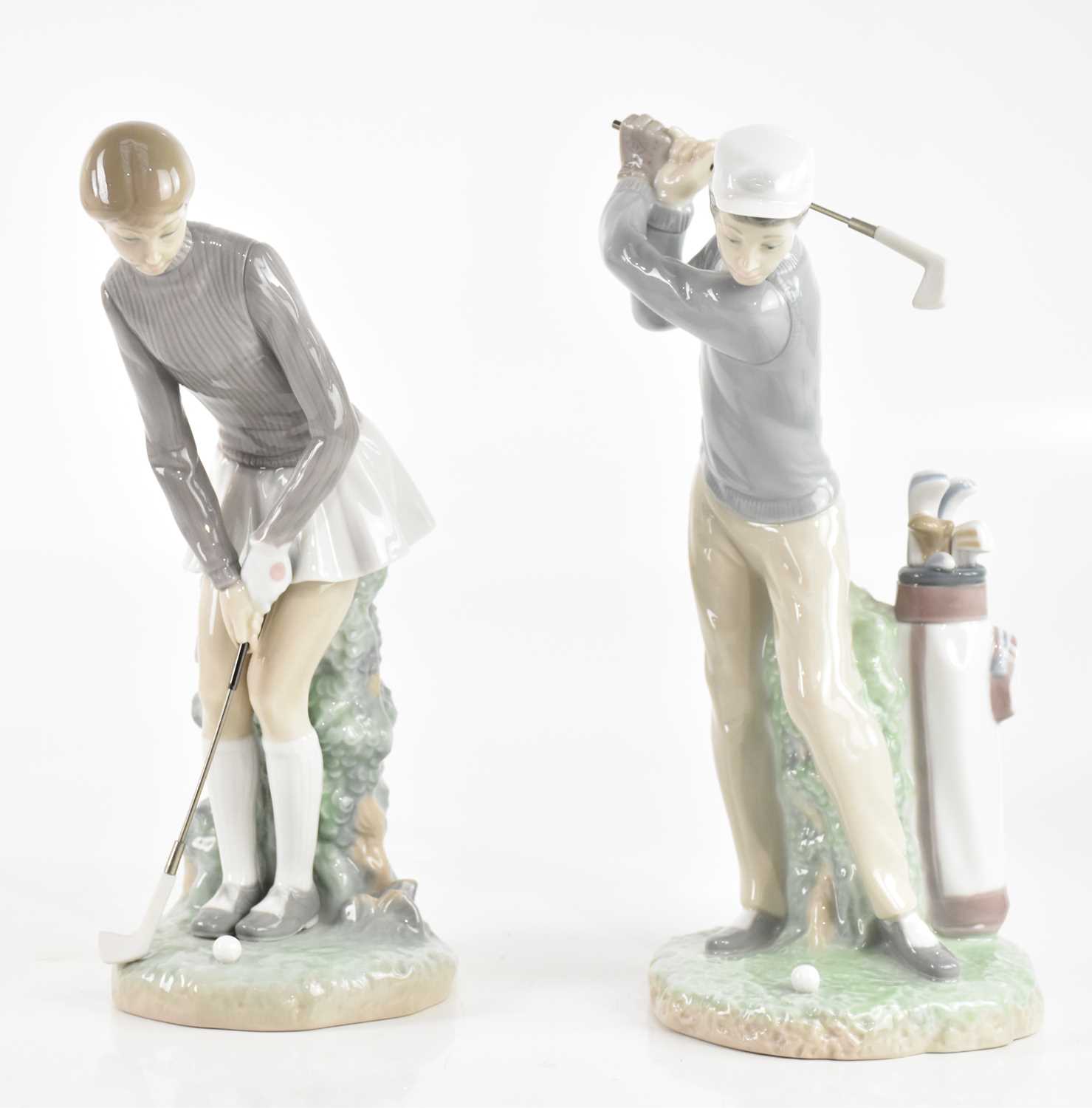Lot 473 - LLADRÓ; a model of a male and female golfer,